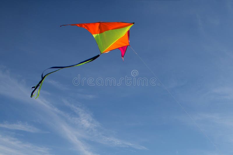 Kite in a bright blue sky stock image. Image of light - 76148899