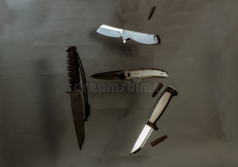 Flying Knives and Bullets. a Few Knives. Knives in the Air Stock Photo ...