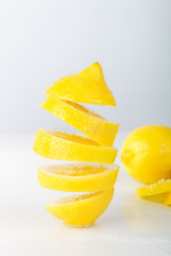 Flying Lemon. Sliced Lemon on White Background. Levity Fruit Floating ...