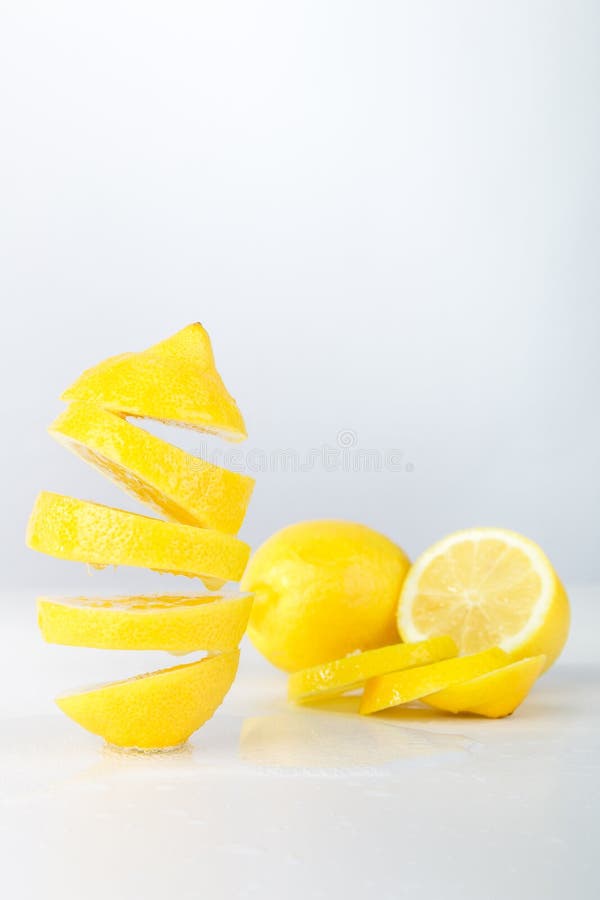 Flying Lemon. Sliced Lemon on White Background. Levity Fruit Floating ...