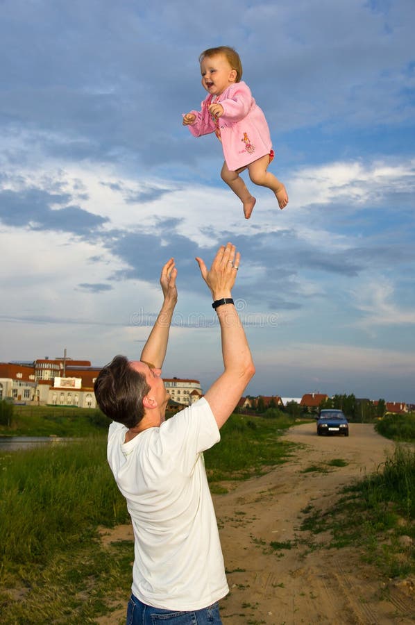 Flying Little Baby with Father Stock Photo - Image of father, flight ...