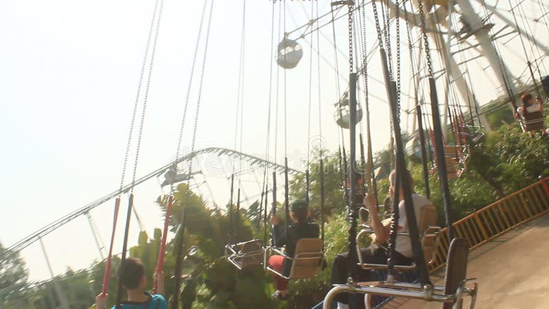 Flying with Merry-go-round Over the Trees. Stock Video - Video of ...