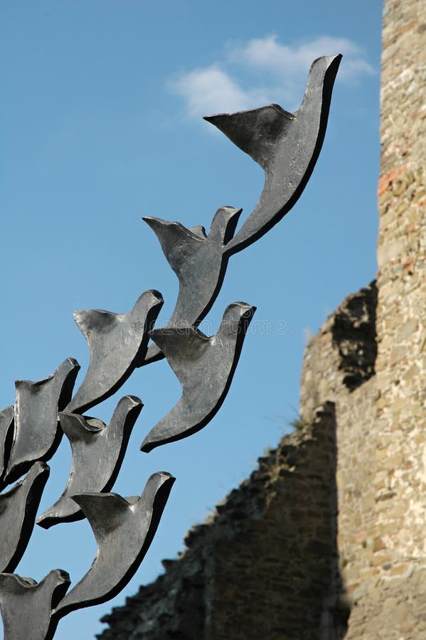 Flying metal doves stock image. Image of grey, metamorphosis - 101382051