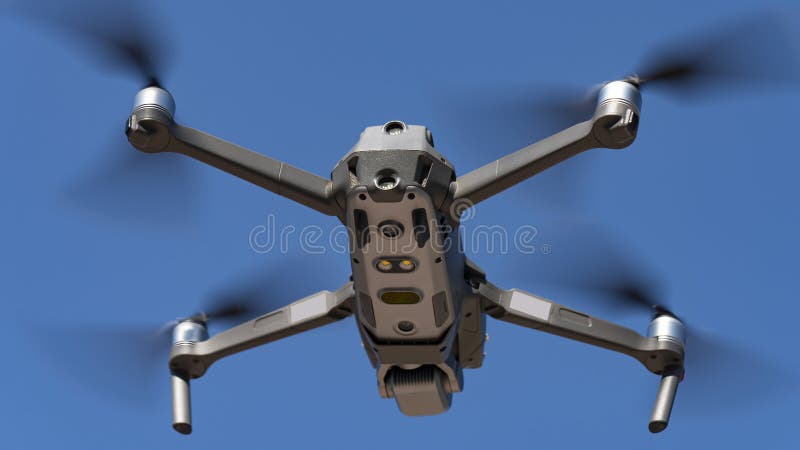 A Flying Mini Drone Recording Video and Photos in the Sky Stock Image ...