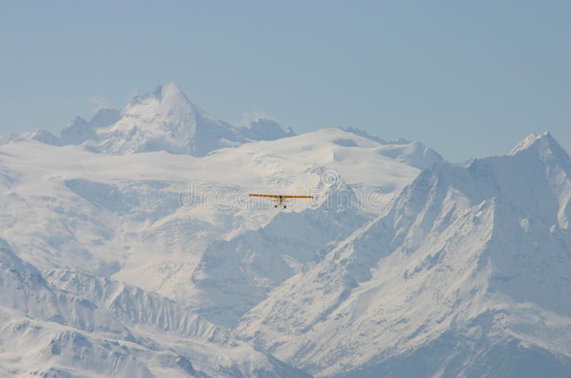 Flying in the mountains stock image. Image of plane, altitude - 927053