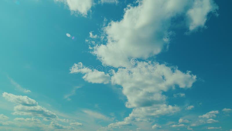 Flying Moving White Clouds in a Blue Sky. Blue Sky Background with Many ...