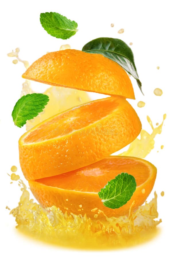 Flying Orange with Splashes of Orange Juice and Mint Stock Photo ...
