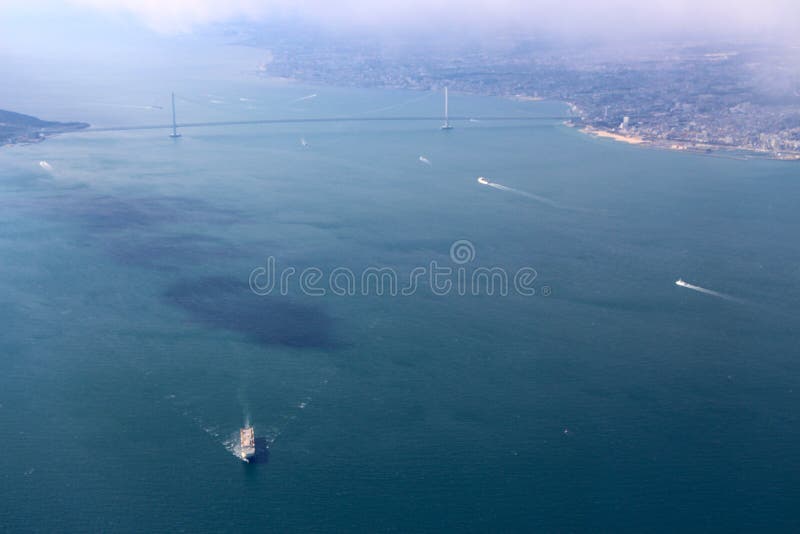 Flying into Osaka Over the Bridge Stock Photo - Image of clouds ...