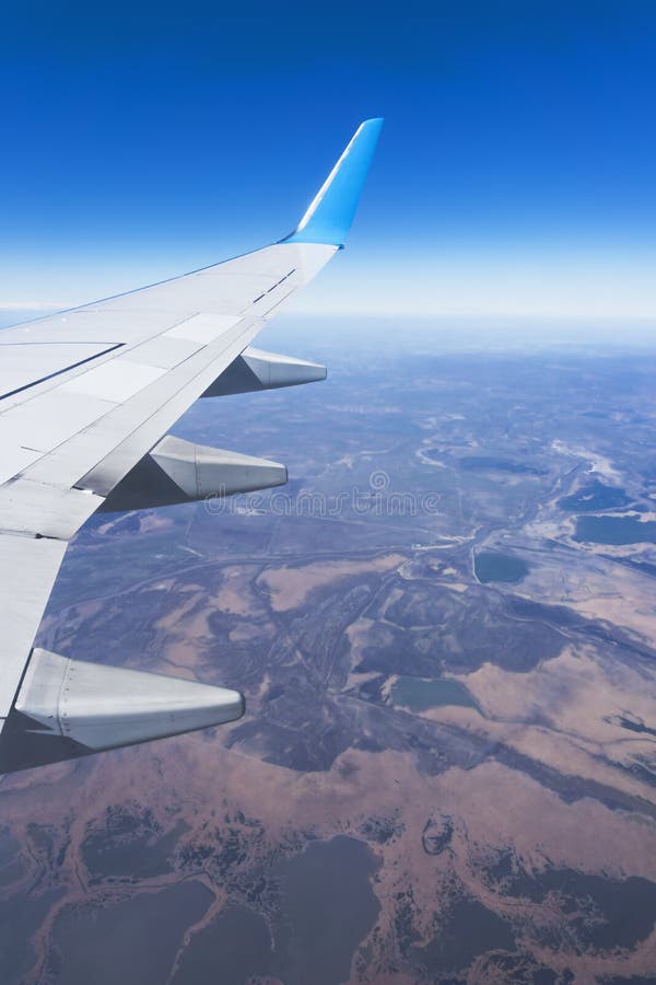 Flying over land stock photo. Image of aircraft, land - 91184756