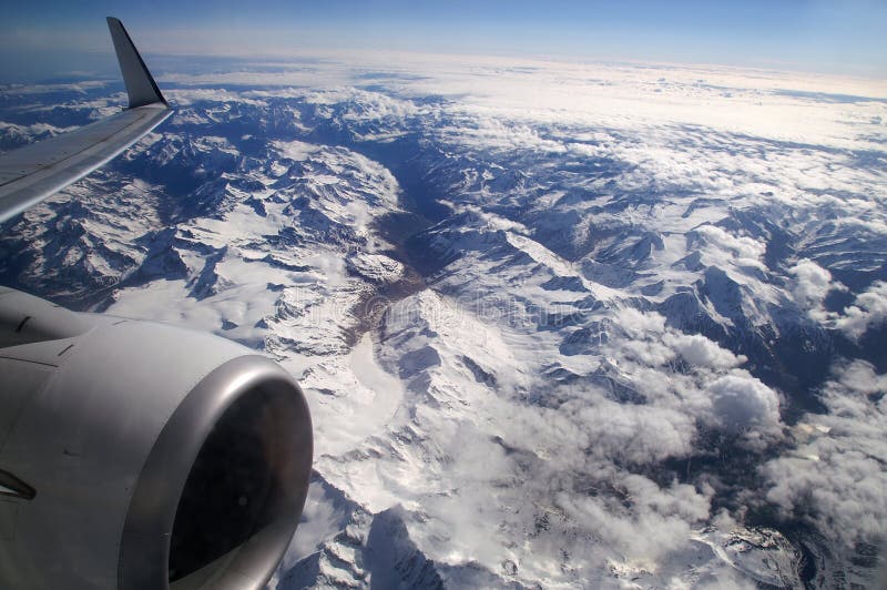 Flying over mountains stock image. Image of mountains - 30946105