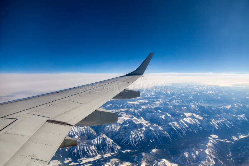Flying over the mountains stock image. Image of snow - 54172705