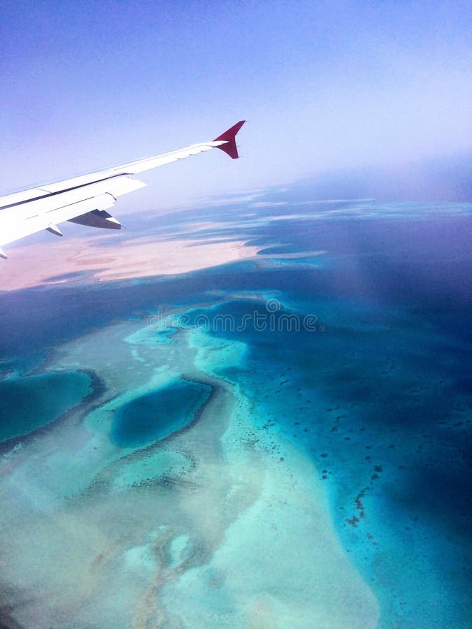 Flying over the red sea stock image. Image of blue, travel - 194313549