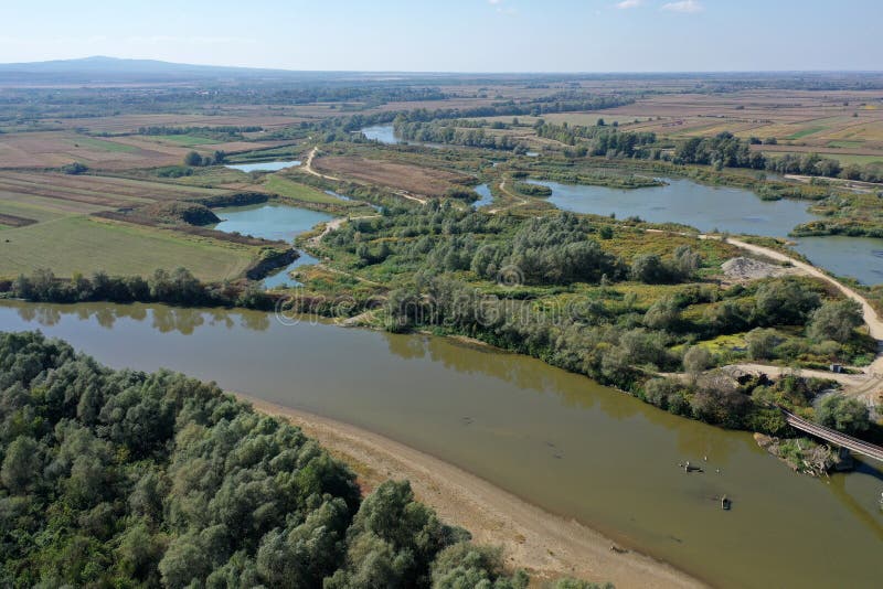 Flying Over a River Flowing on a Plain Aerial View Stock Image - Image ...