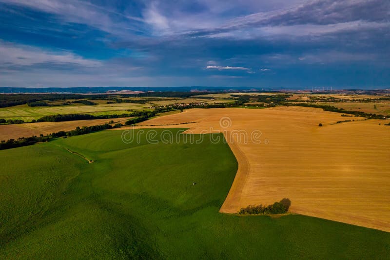 Flying Over Some Golden Fields and Green Forests. Stock Photo - Image ...