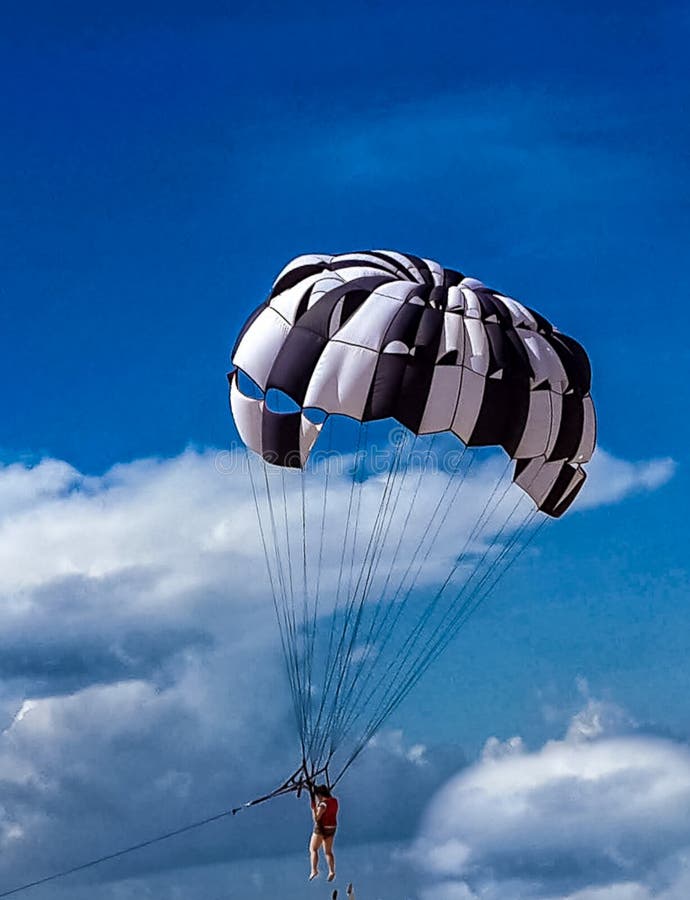 Flying with a Parachute in the Blue Sky Stock Image - Image of ...
