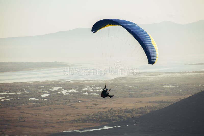 Flying paraglider. stock photo. Image of flying, jump - 177030898
