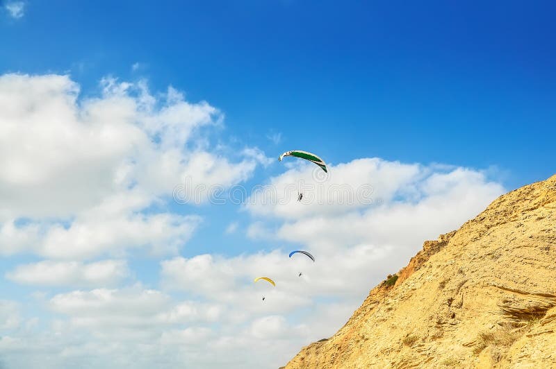 Flying Paragliders stock image. Image of airplane, excitement - 46591095