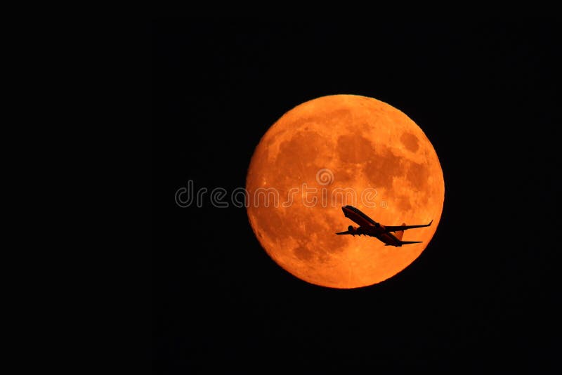 Flying Plane Against the Background of Red Moon Stock Image - Image of ...