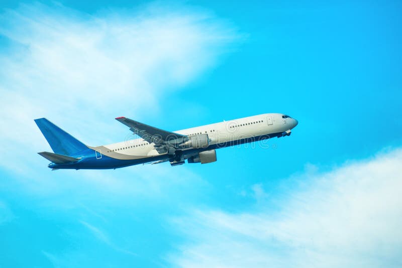 Flying Plane on Blue Sky Background Stock Image - Image of clouds ...