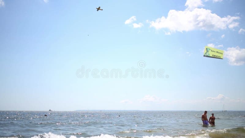 Flying Plane Drags Ads on Brighton Beach Stock Video - Video of ...