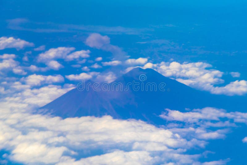 Flying by Plane Over Mexico View of Volcanoes Mountains Clouds Stock ...