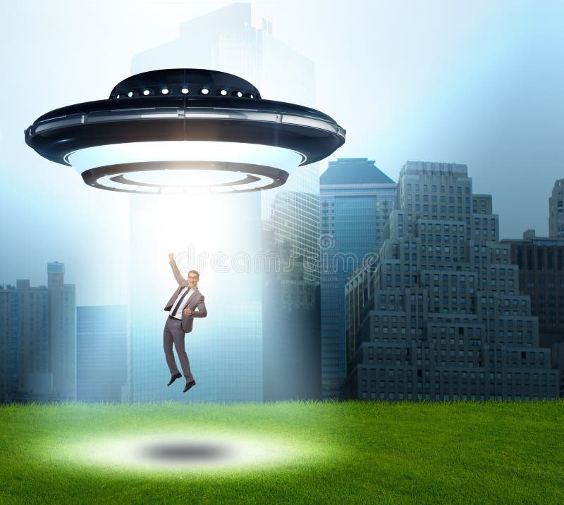 Flying Saucer Abducting Young Businessman Stock Photo - Image of ...