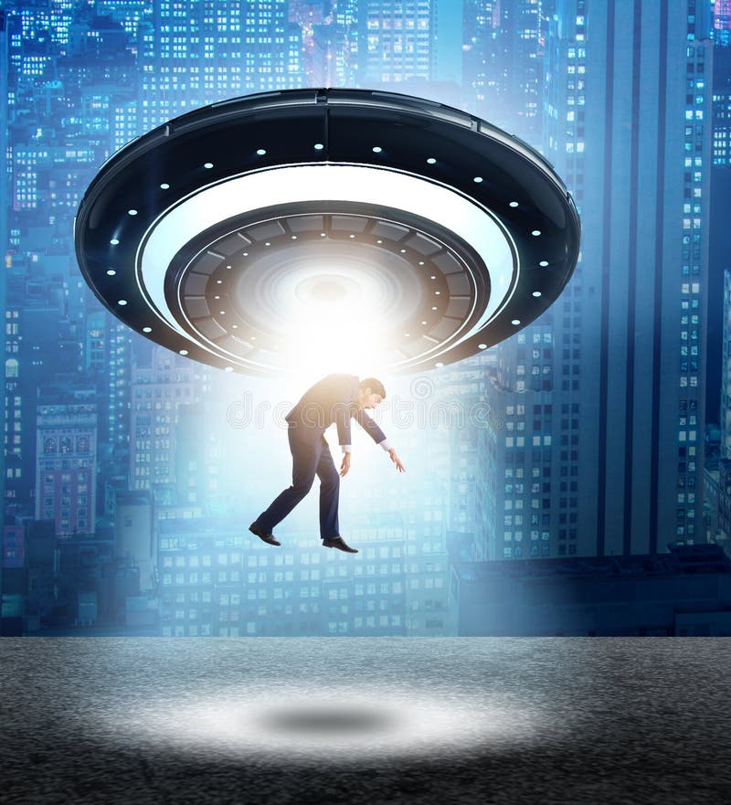 Flying Saucer Abducting Young Businessman Stock Photo - Image of light ...