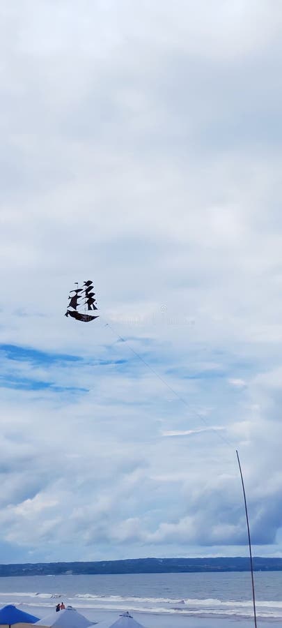 Flying Ship, Rainbow Colored Ship Kite Flies on the Blue Sky and Cloud ...