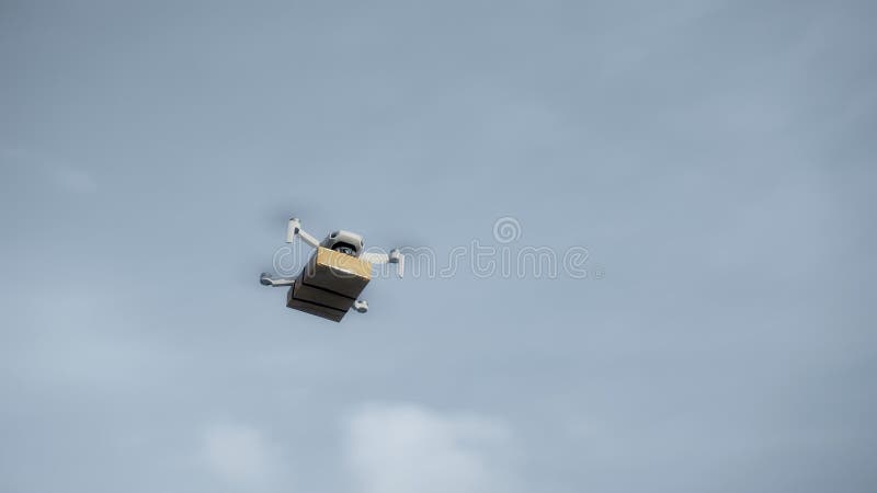 Flying on a Sky Delivery Drone with Holding a .cardboard Parcel Stock ...