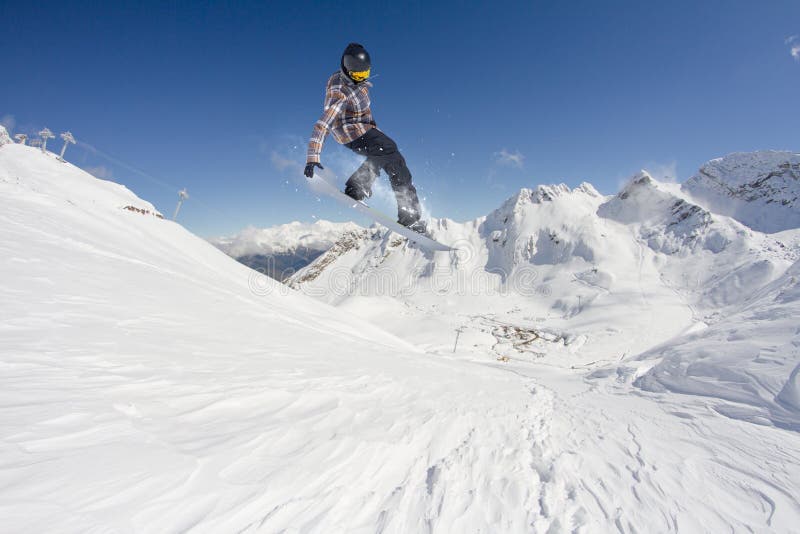 Flying Snowboarder on Mountains, Extreme Sport Stock Image - Image of ...