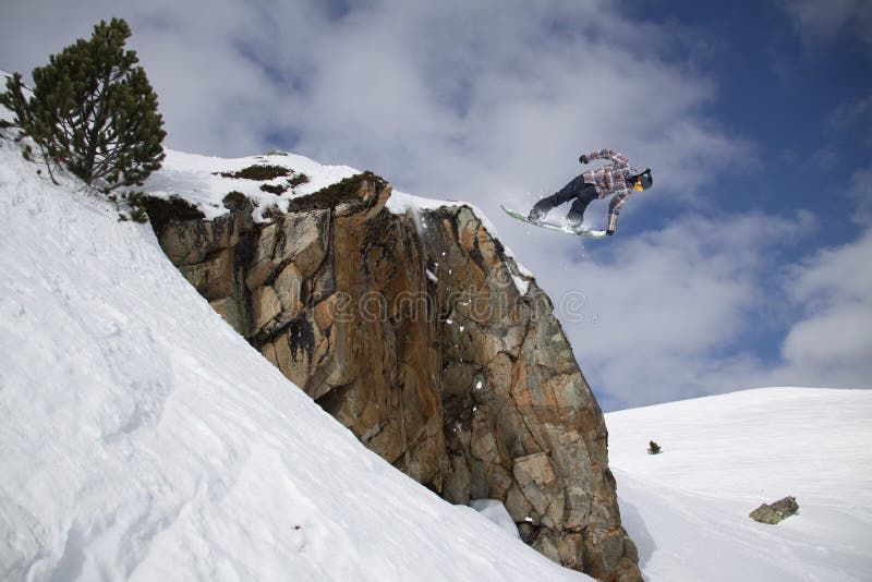 Flying Snowboarder on Mountains Editorial Photography - Image of ...