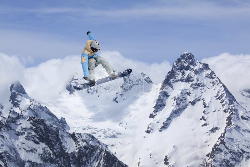 Flying Snowboarder on Mountains, Extreme Sport Stock Image - Image of ...