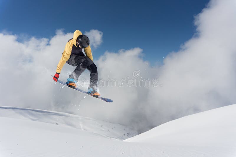 Flying Snowboarder on Mountains. Extreme Sport Editorial Photo - Image ...