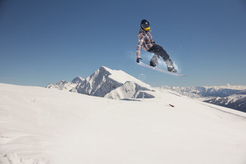 Flying Snowboarder on Mountains. Extreme Sport. Stock Photo - Image of ...