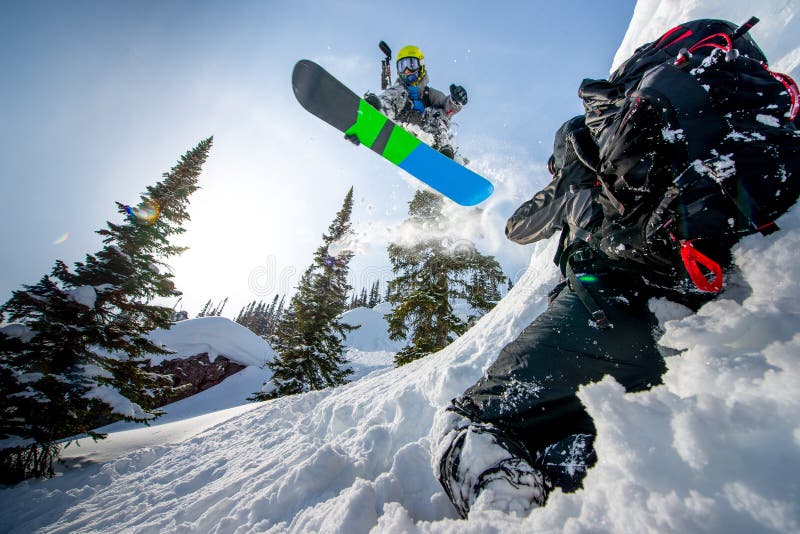 Flying Snowboarder in the Mountains Stock Photo - Image of flight, cold ...