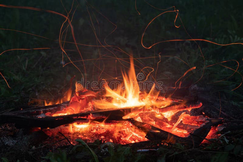 Flying Sparks from a Campfire Stock Image - Image of fiery, fire: 245170603