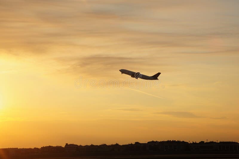 Plane Taking Off at Sunset at Philadelphia Airport Stock Photo - Image ...