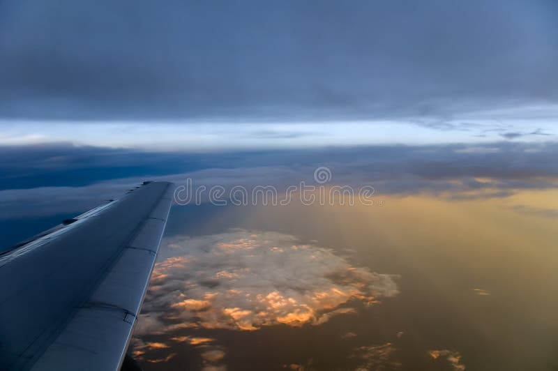 Flying at Sunset stock photo. Image of journey, fuselage - 11333600