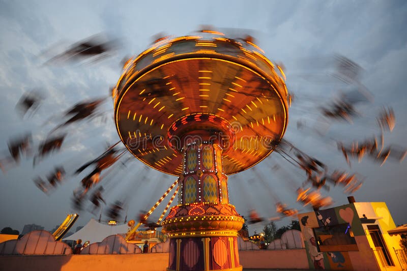 Flying swing at night editorial image. Image of exciting - 30617840