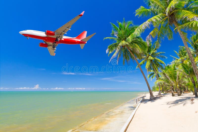 Airplane Flying Over Tropical Beach Travel Concept Stock Photo - Image ...