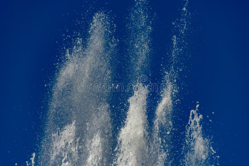 Flying Water Bursts on Blue Background Stock Image - Image of frozen ...