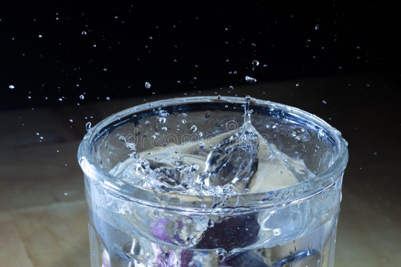 Flying water drops stock photo. Image of liquid, flying - 192615660