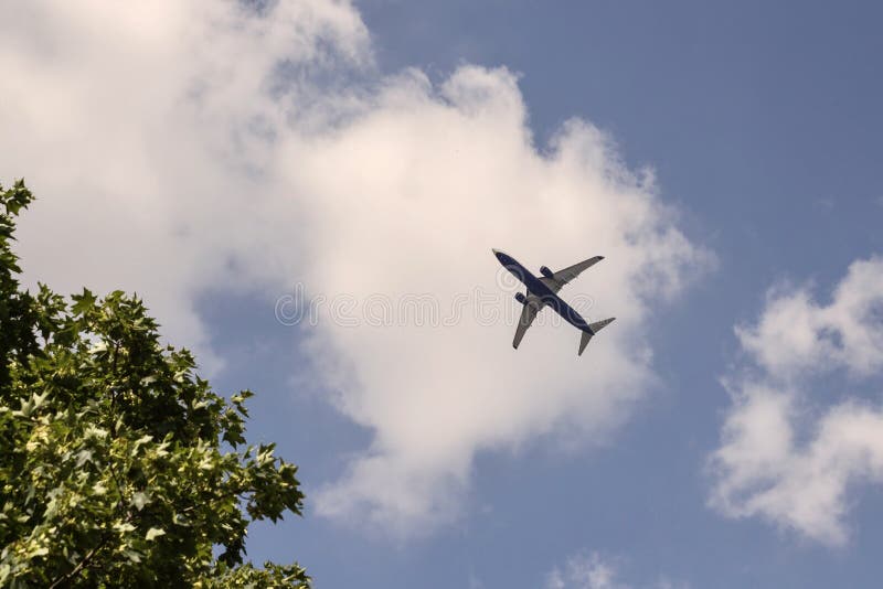 Flying Airplane High in the Sky Stock Image - Image of flying, speet ...