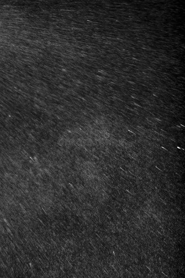 Flying White Spatter Spray or Blizzard Snow Storm on Black Background ...