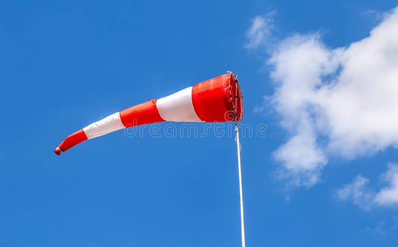 Flying Windsock Wind Vane with Red and White Lines Stock Photo - Image ...