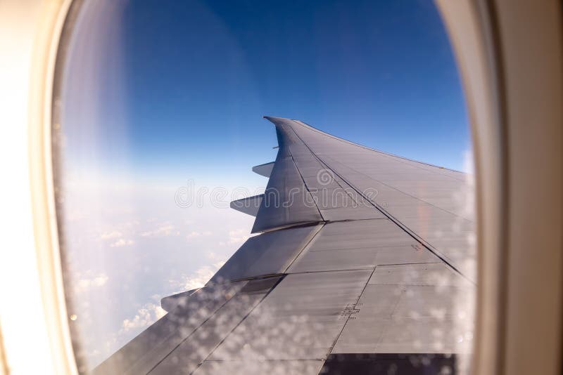 Flying Wing Passenger Aircraft on a Background of Blue Sky and Clouds ...