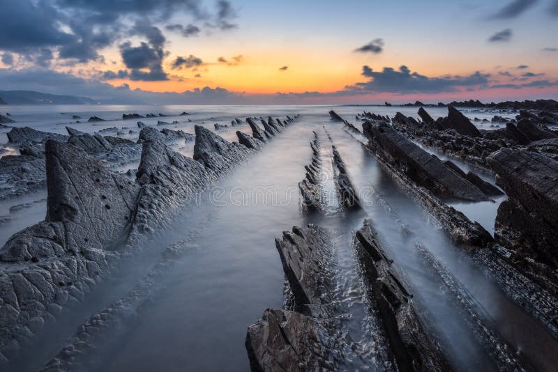 Flysch of Sakoneta Beach at Sunset, Basque Coast Geopark, Spain Stock ...