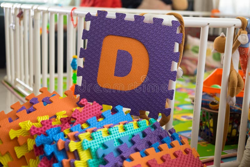 Foam Alphabet Puzzle Pieces, D Stock Photo - Image of characters ...
