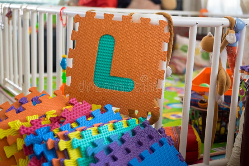 Foam Alphabet Puzzle Pieces, L Stock Image - Image of foam, childhood ...