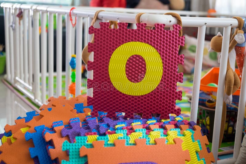 Foam Alphabet Puzzle Pieces, O Stock Photo - Image of connection, basic ...